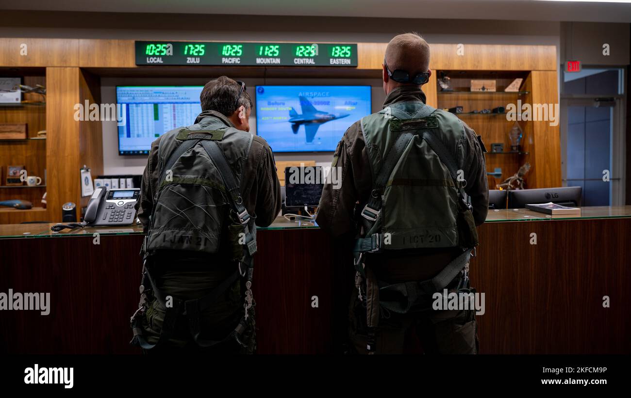 U.S. Air Force Lt. Col. Matthew Eldredge (right), former 309th Fighter Squadron commander ...