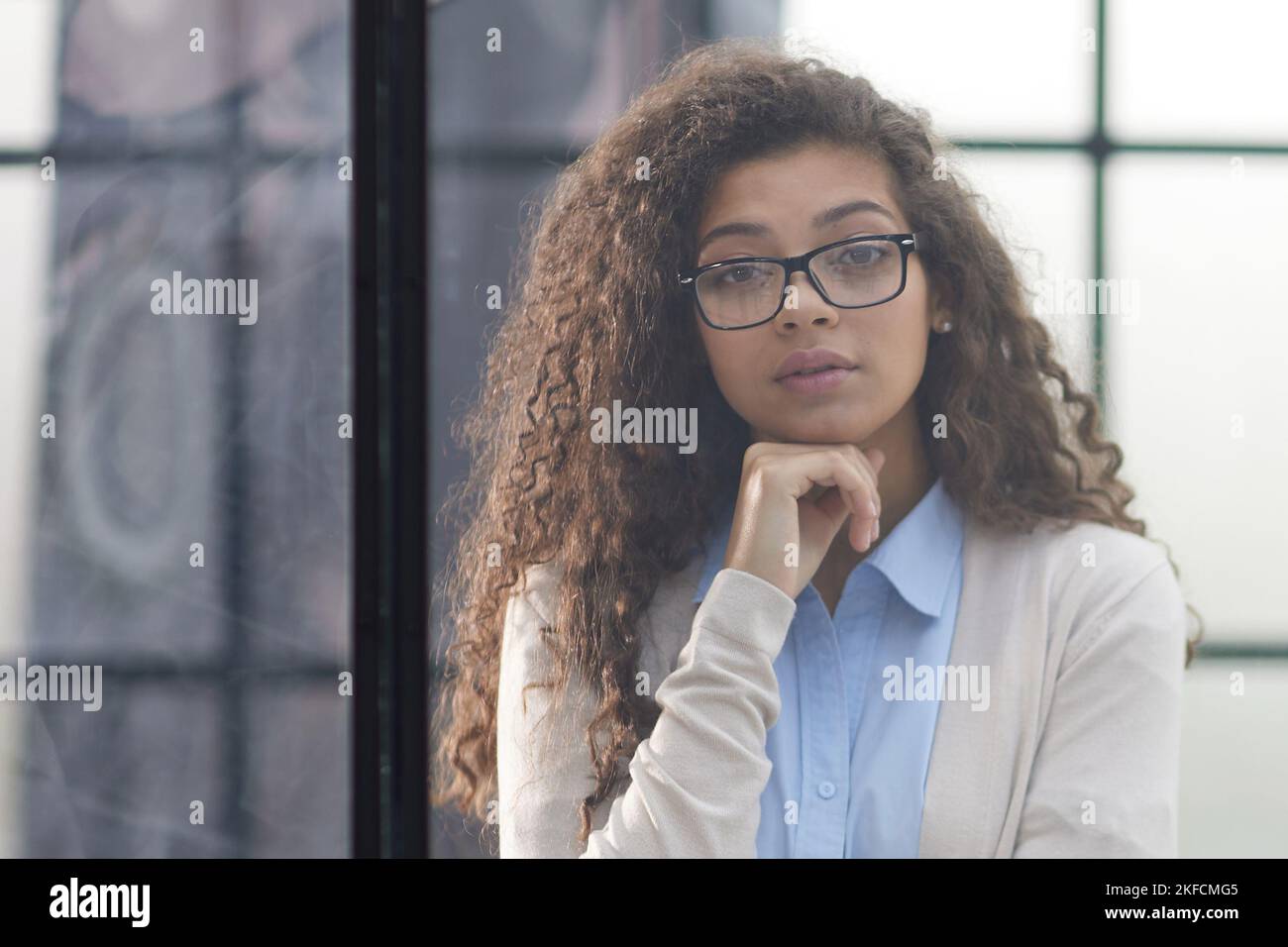 Business woman in the office outside the window Stock Photo - Alamy