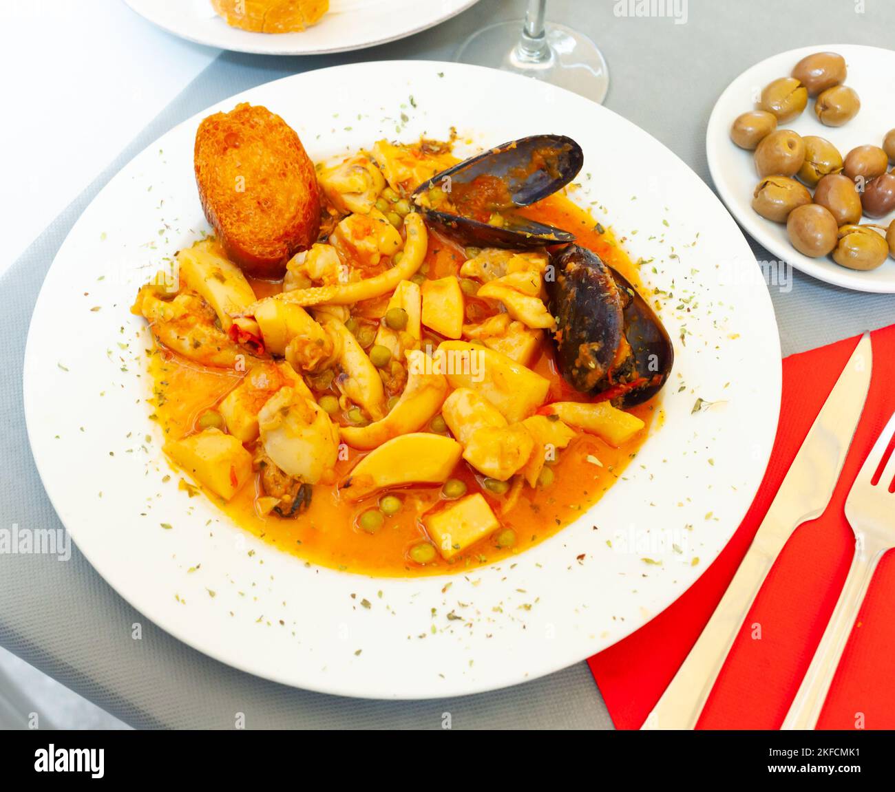 Appetizer cooked fried cuttlefish with spicy sauce Stock Photo - Alamy