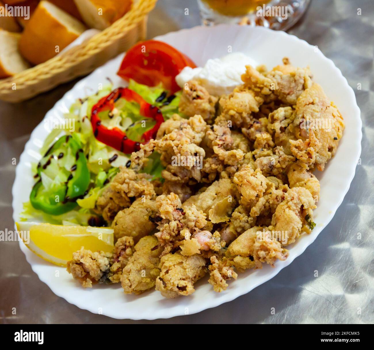 Crispy baby squid hi-res stock photography and images - Alamy