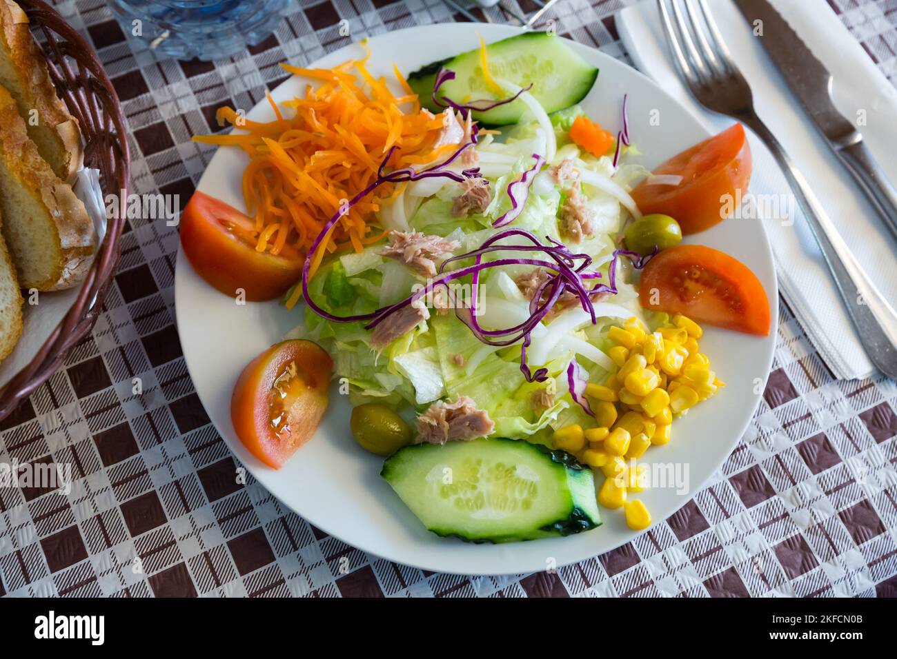 Mixed salad with lettuce, fresh vegetables, corn and boiled carrot ...
