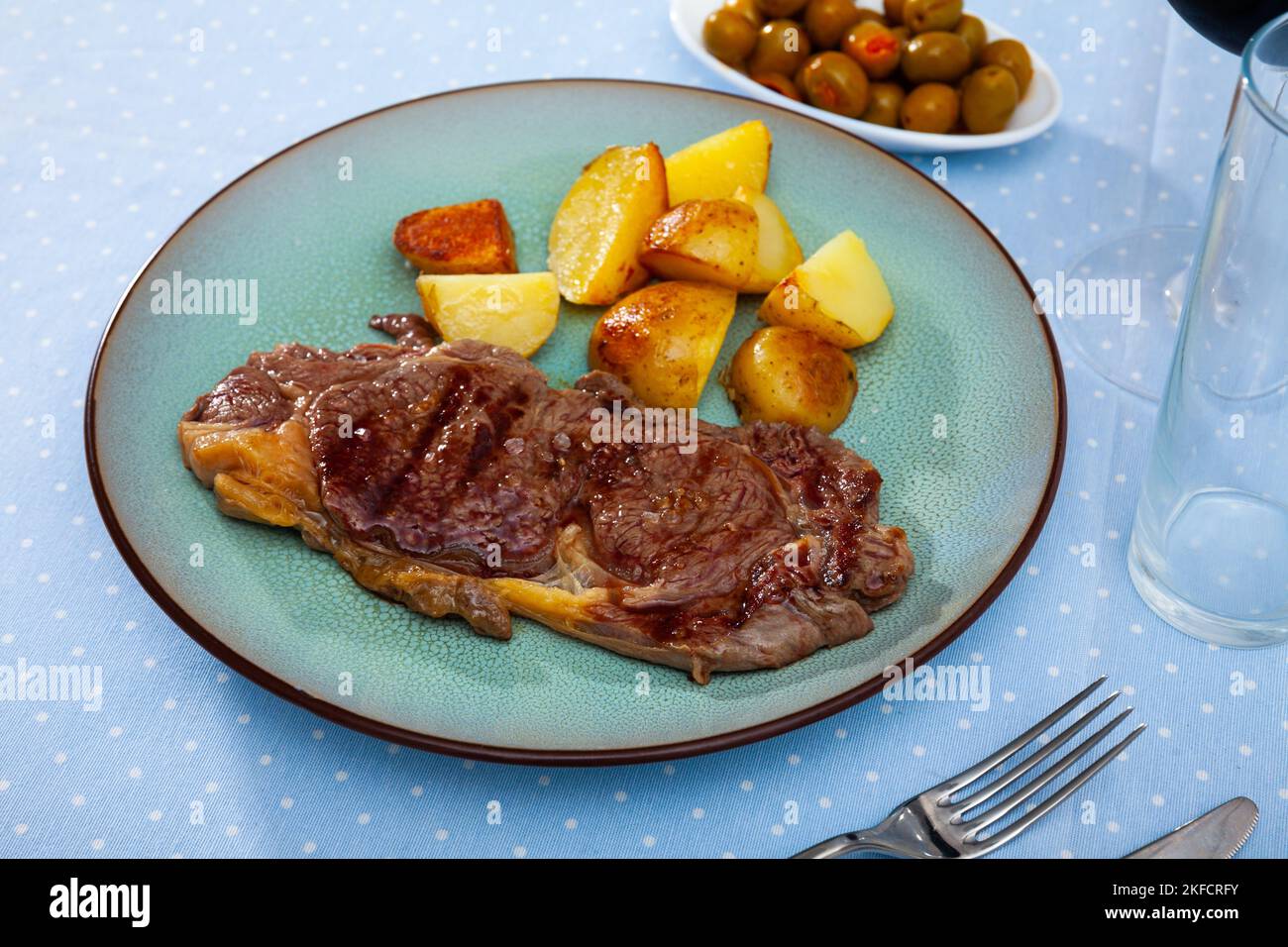 Juicy beef entrecote with baked potato Stock Photo - Alamy
