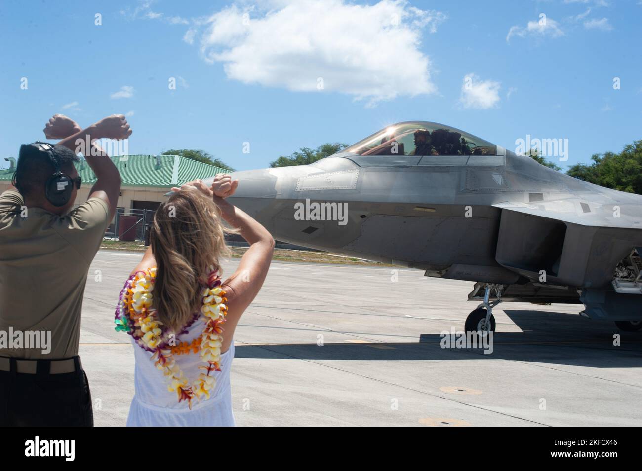 Sherilyn Carlson, spouse of the outbound 154th Wing commander, marshals ...