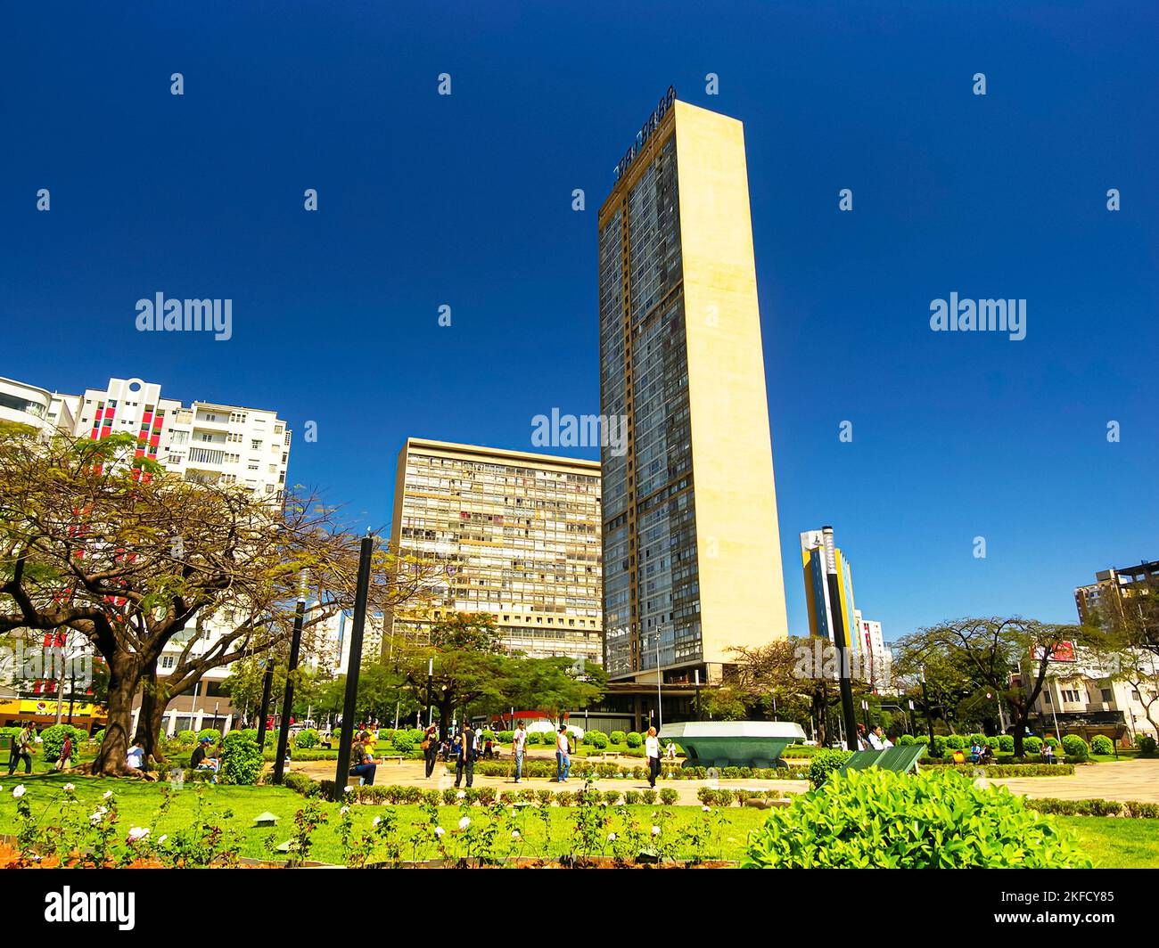 JK Building by architect Oscar Niemeyer. Beautiful blue sky. trees ...