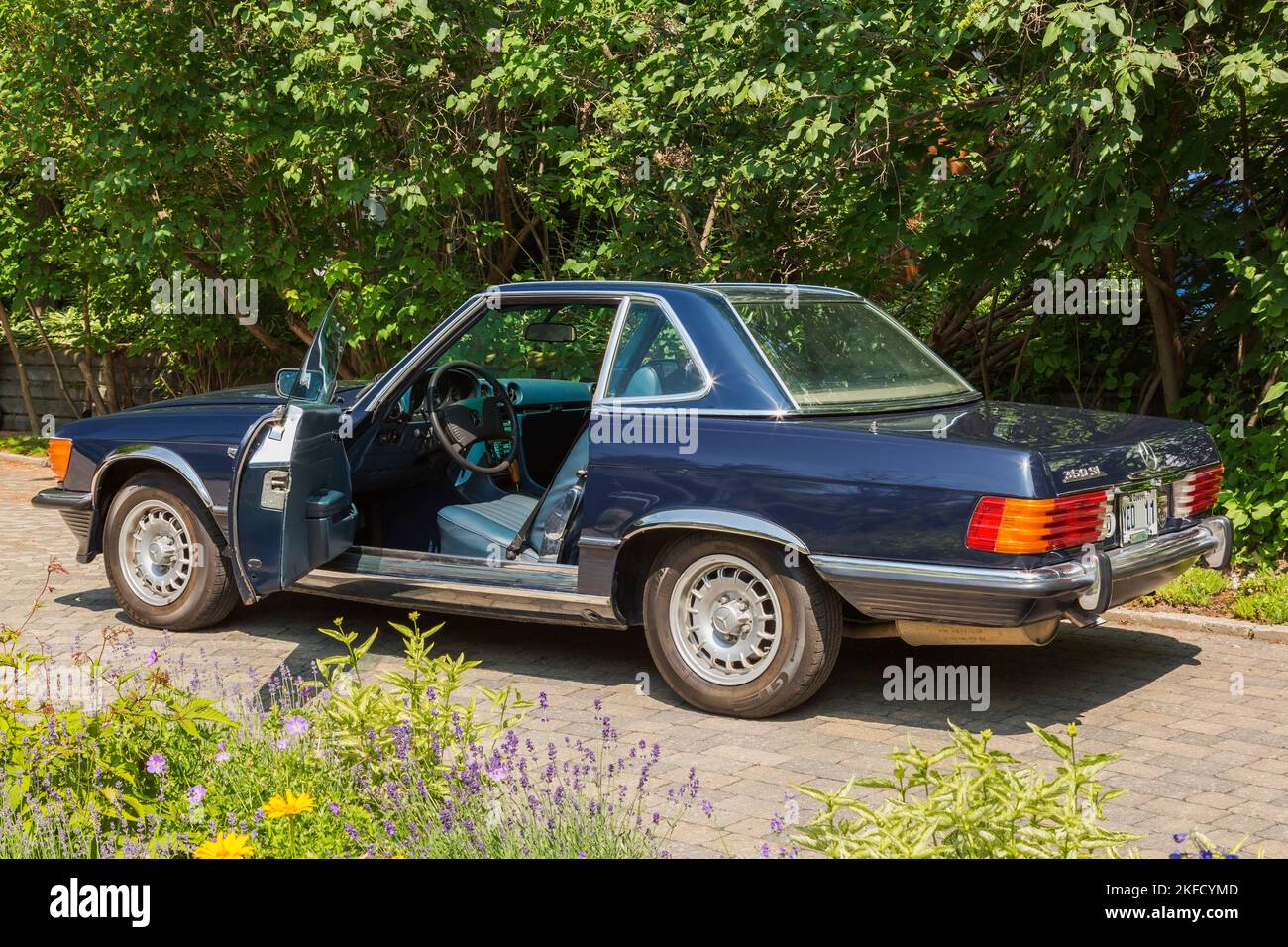 1972 blue Mercedes 350 SL with opened door on driver's side parked in ...
