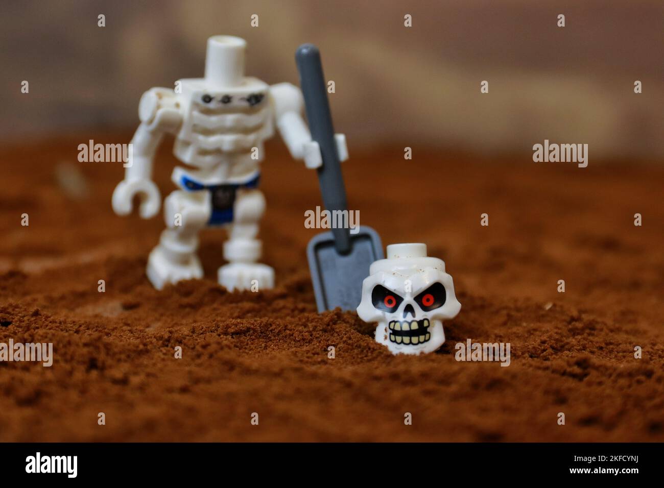 A closeup of a halloween toy skeleton with red eyes Stock Photo - Alamy