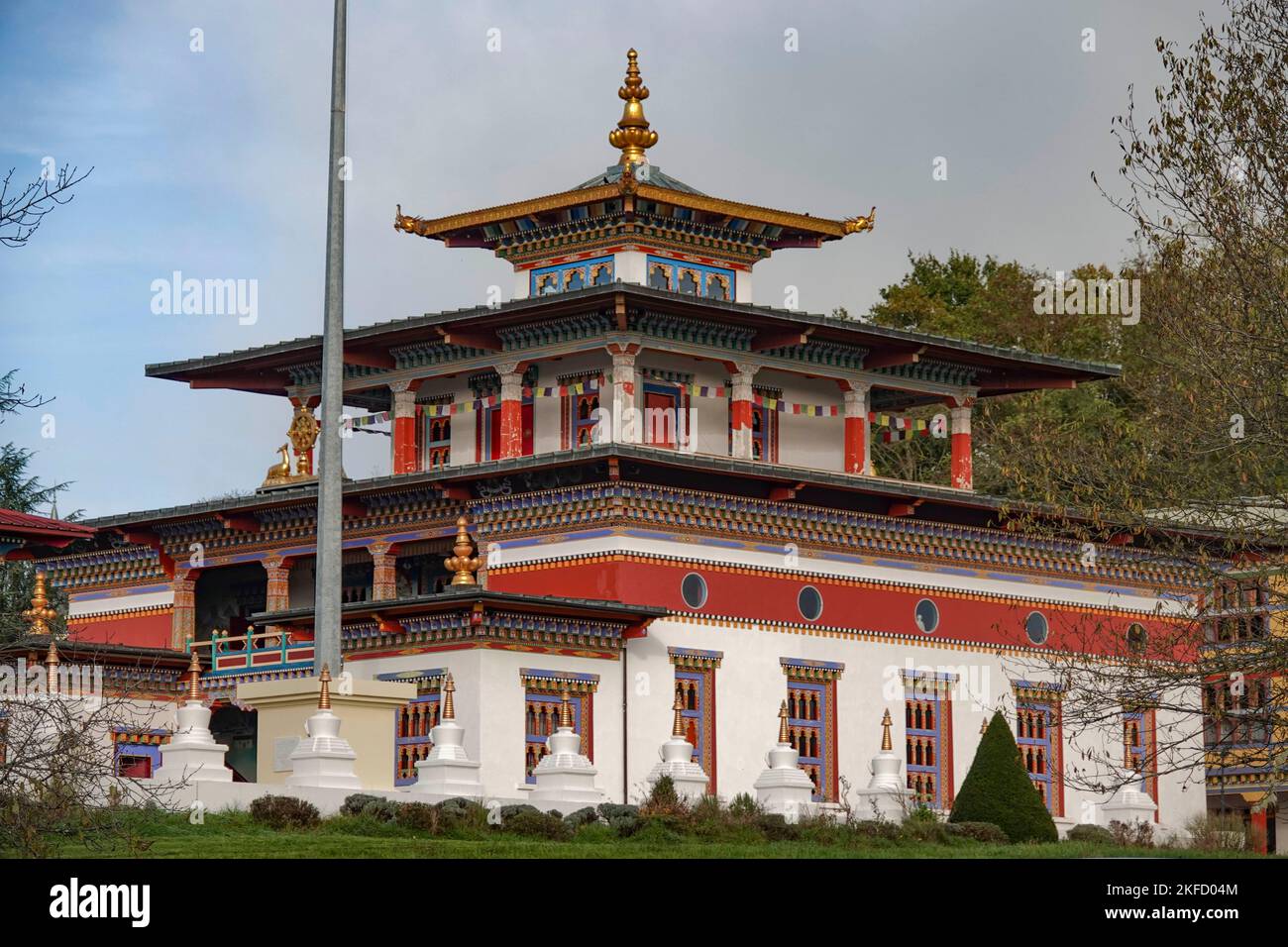 The exterior design of buddha Temple against the sky and a tree Stock ...