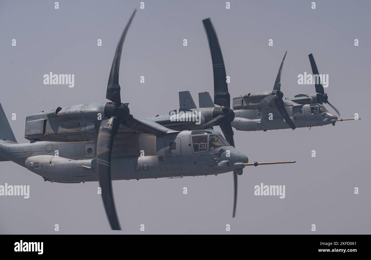 Two U.S. Marine Corps MV-22 Ospreys assigned to Marine Medium Tiltrotor Squadron 163 (VMM-163 ...