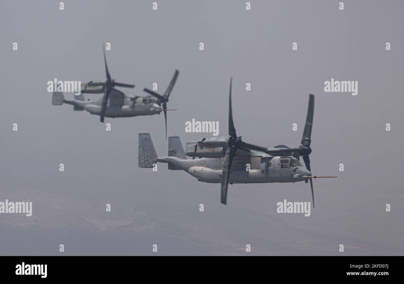 Two U.S. Marine Corps MV-22 Ospreys assigned to Marine Medium Tiltrotor Squadron 163 (VMM-163 ...