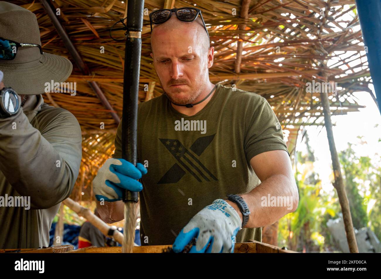 U.S. Coast Guard DV2 David Blincoe, a Coast Guard diver assigned to the ...