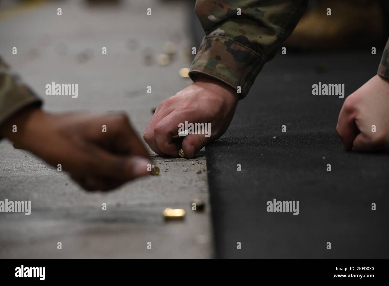 Members of the 509th Bomb Wing Security Forces, pick up casings during ...