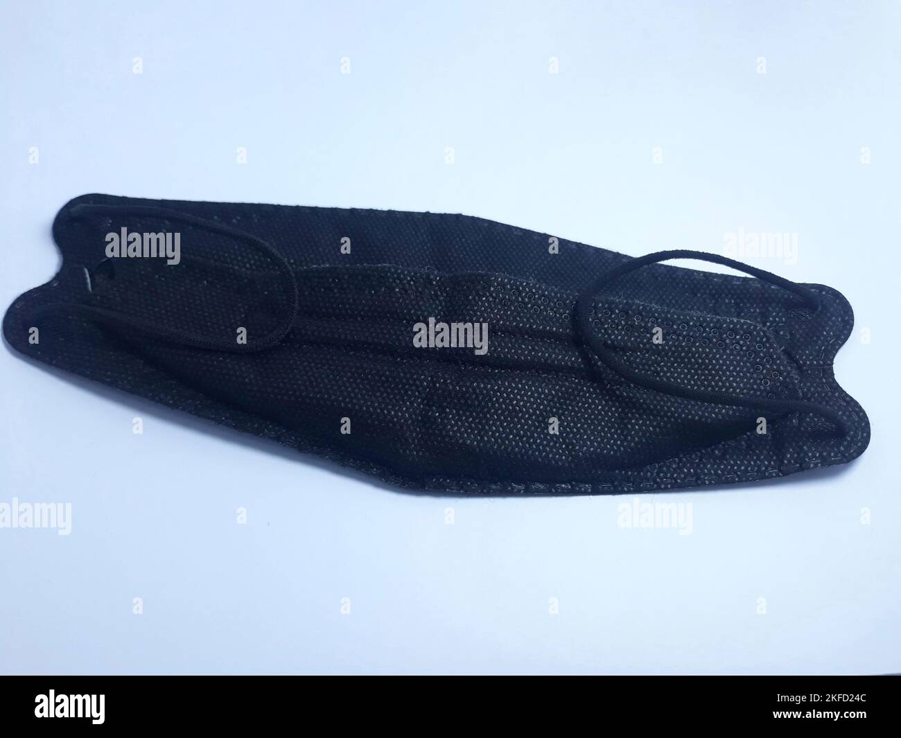 Close up isolated on white blue masks to protect against viruses and ...