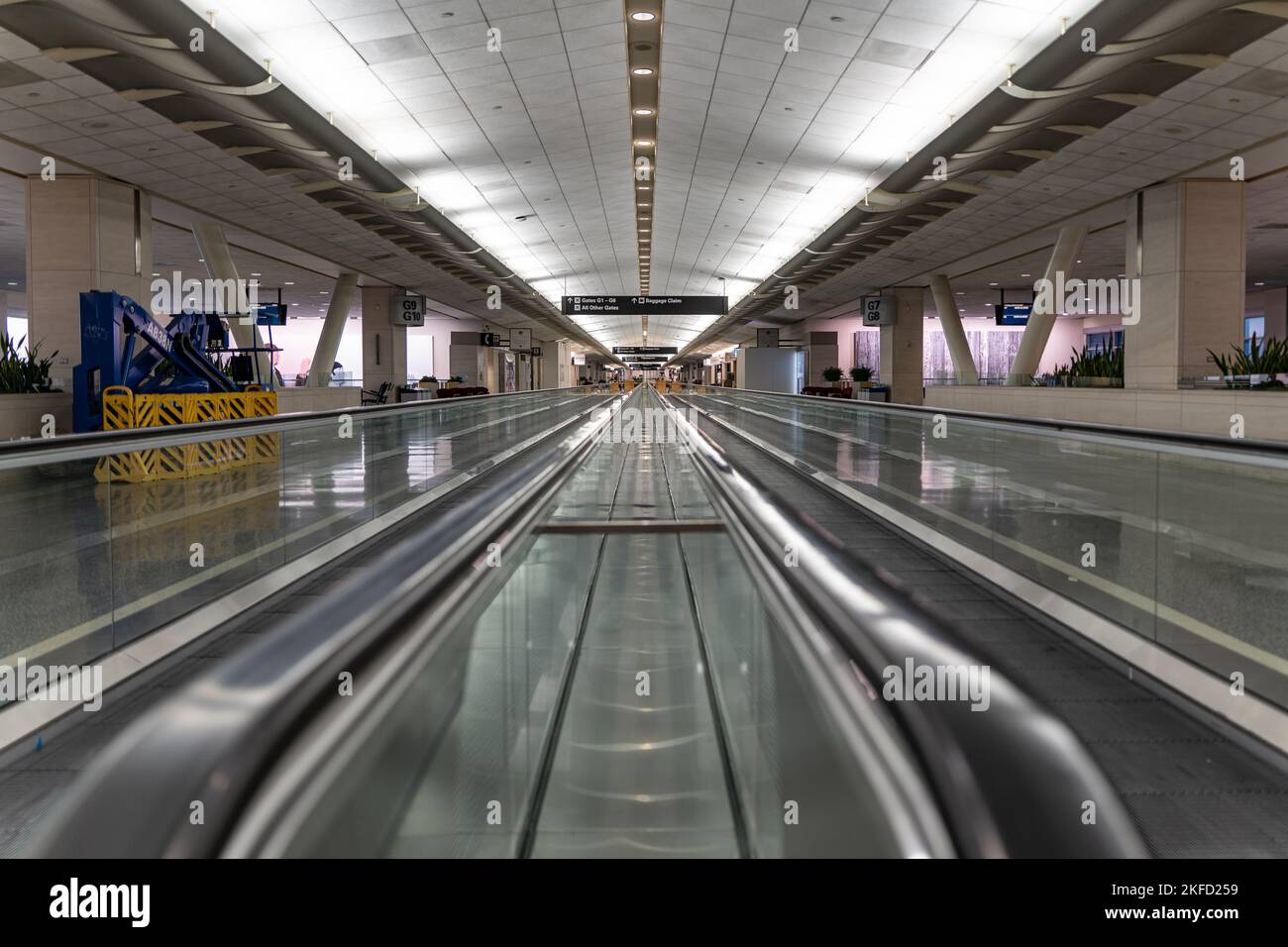 A Moving Walkway leading to the gates at the airport terminal G ...
