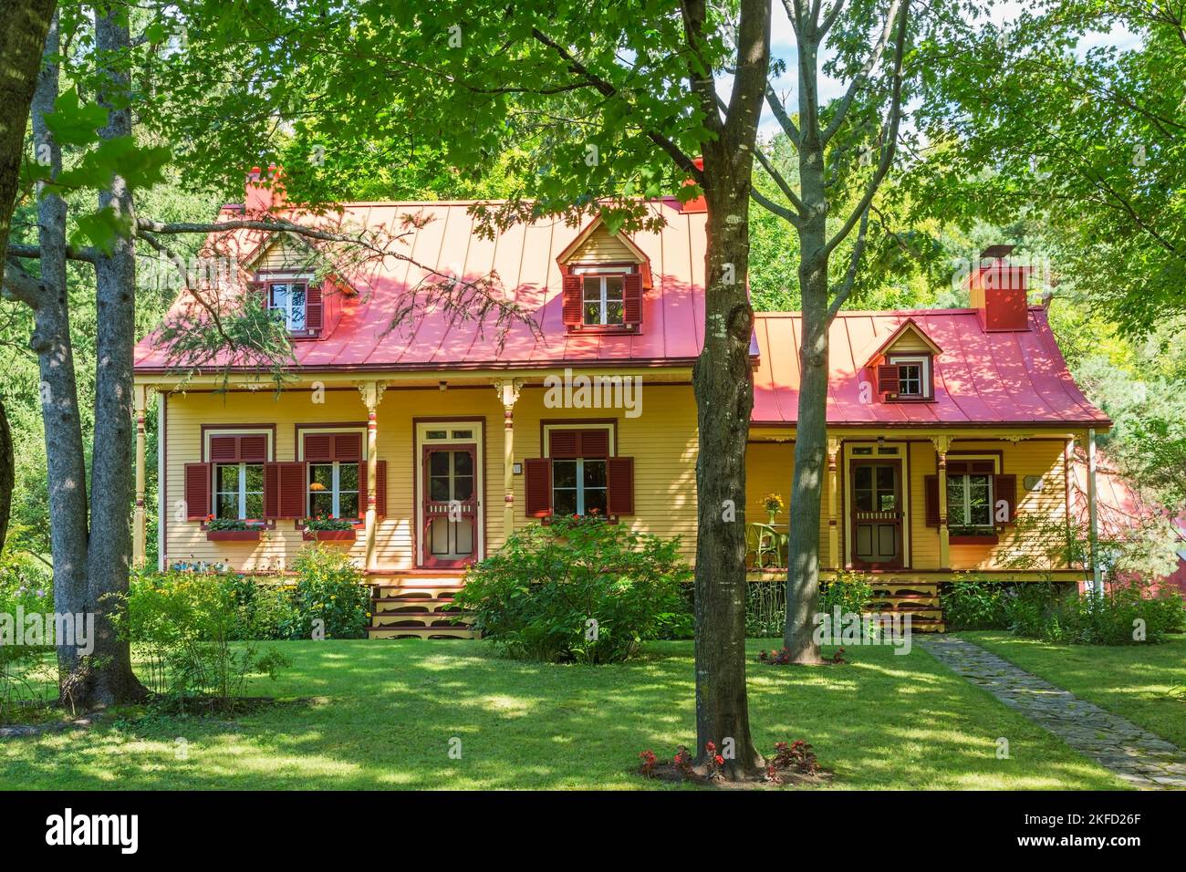 Yellow House With Red Metal Roof Pros And Cons Of A Metal Roof House