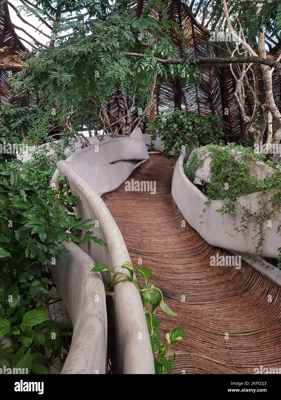 A vertical shot of Azulik Resort with a fantastic architectural piece ...