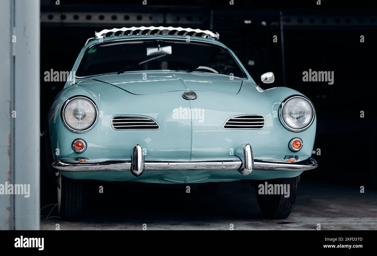 A vintage blue Volkswagen Karmann Ghia in the garage Stock Photo - Alamy