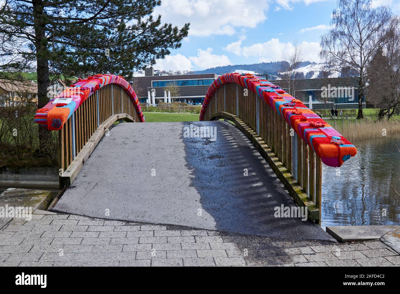 A Bridge with knitted elements on handrail as local artwork Stock Photo ...