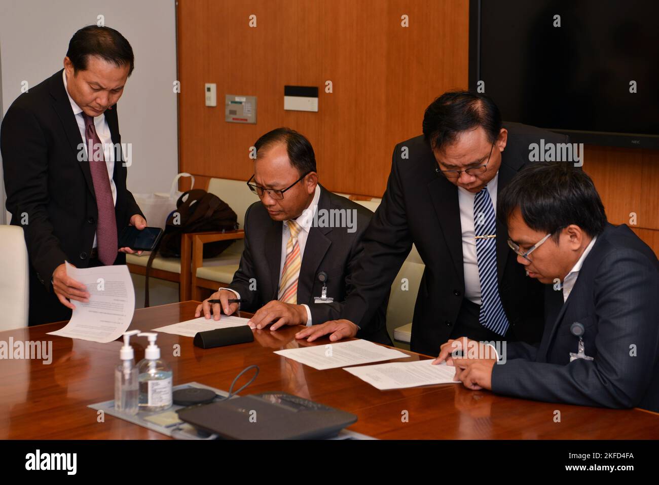 Lao People's Democratic Republic (Laos PDR) delegation review a ...