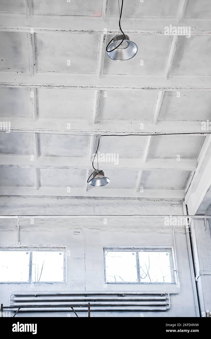 Lamp in abandoned industrial factory hi-res stock photography and ...