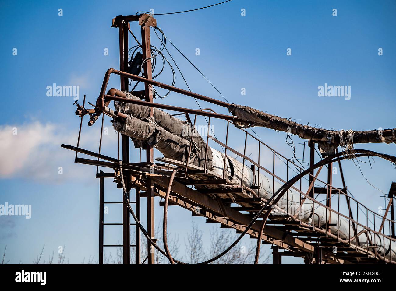 Old destroyed construction site. Rusty scaffolding and construction ...