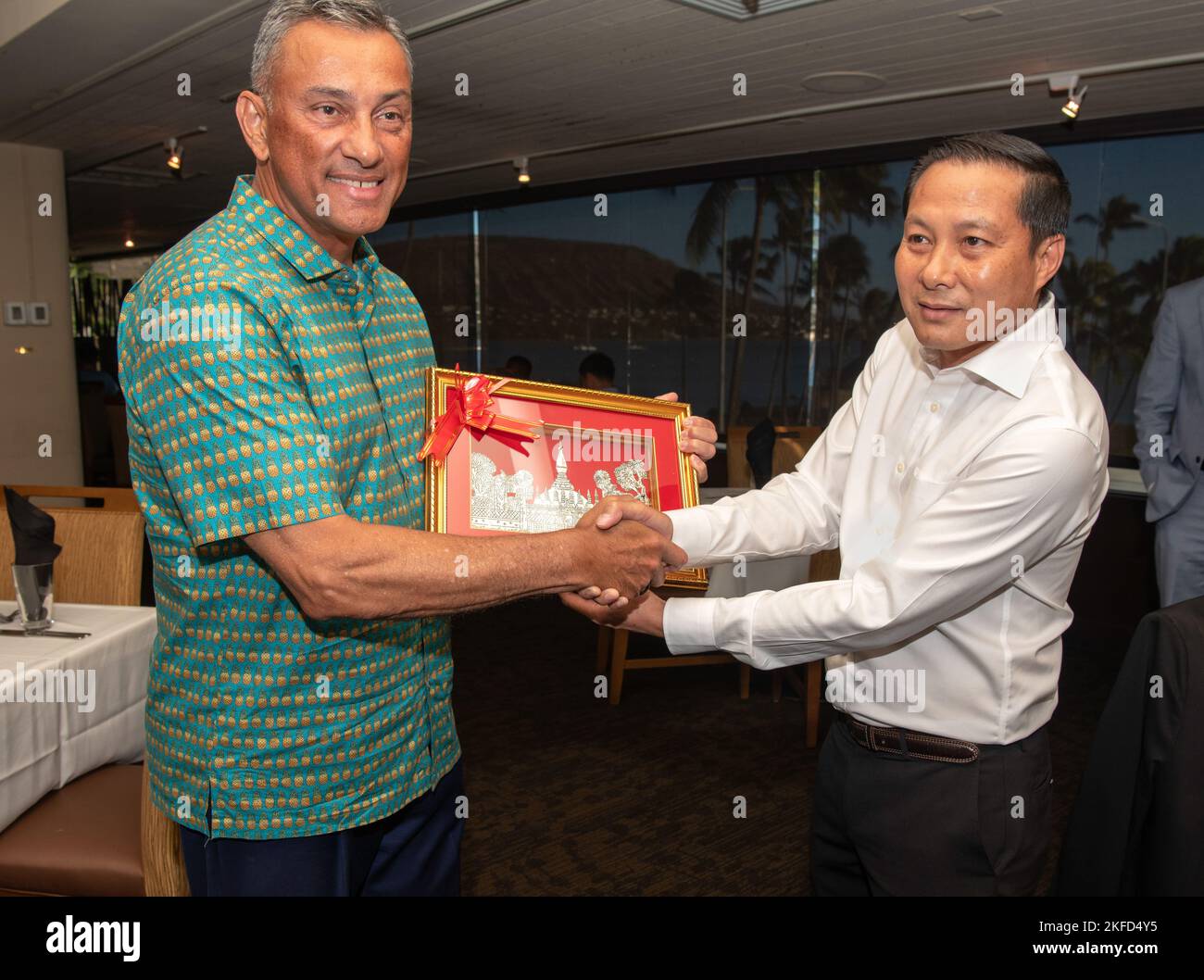 From right, Mr. Mayboua Xayavong, Director General of Americas ...