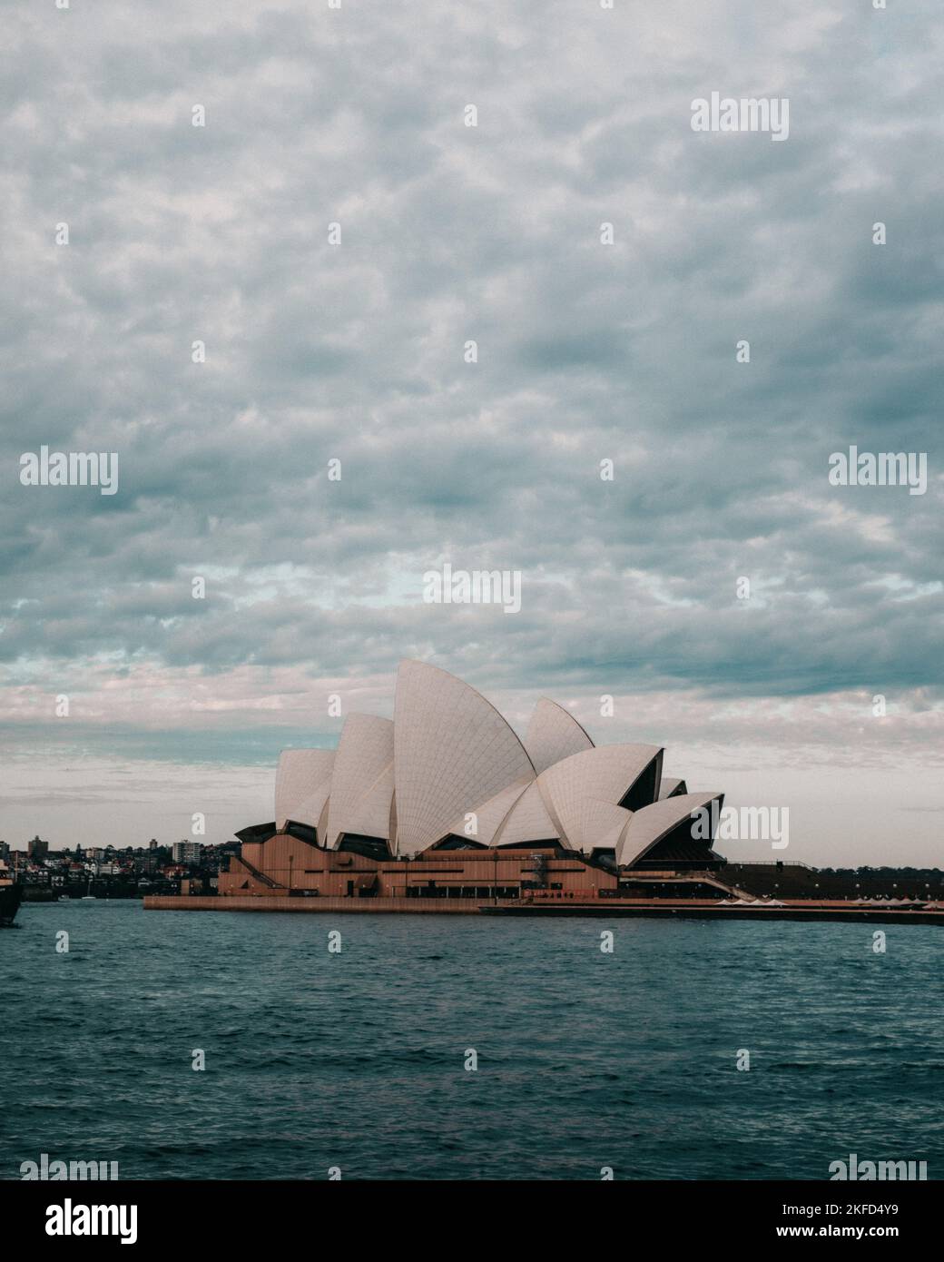 A vertical shot of the Sydney Opera House in the evening Stock Photo ...