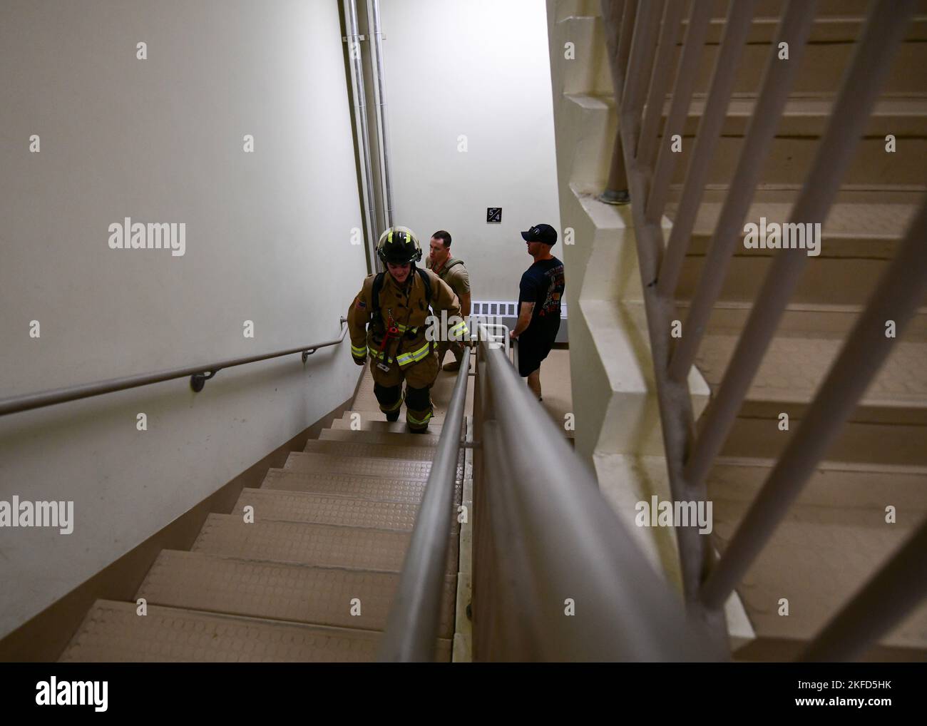 Airmen from the 8th Fighter Wing participate in a stair climb as part ...