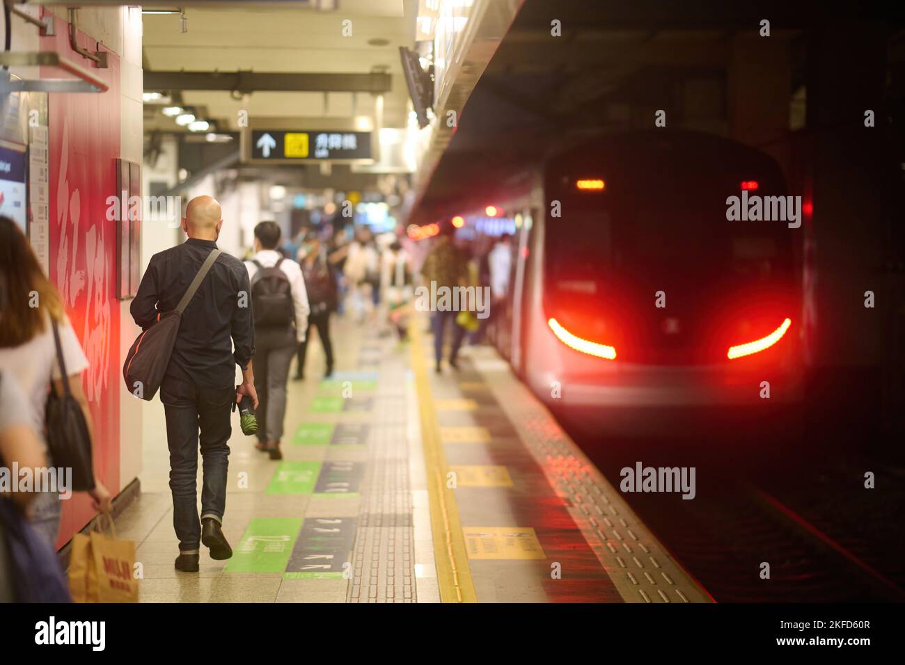 An underground train departing from old Hung Hom station in Hong Kong ...