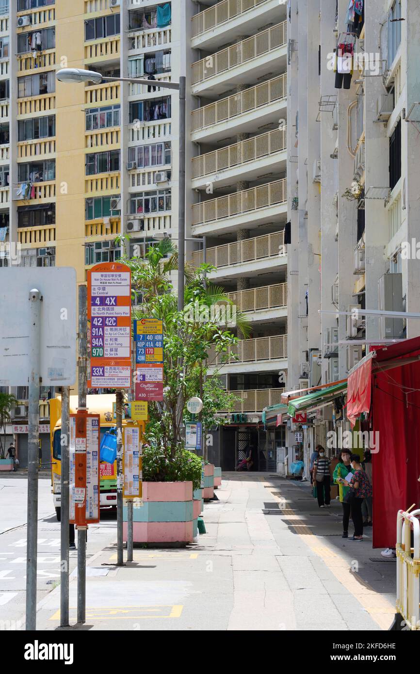 A vertical shot of the bus station at Wah Fu Estate on a sunny day ...