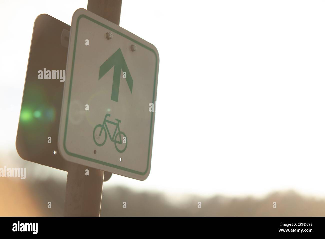 A cyclist road sign with a green frame and white background Stock Photo ...