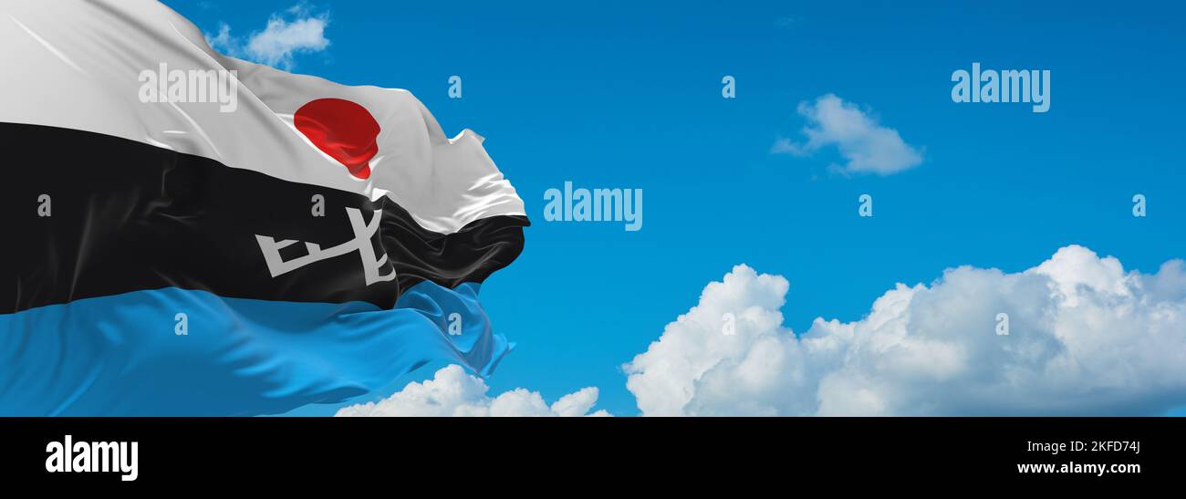 flag of Chukotko-Kamchatkan peoples Evenks at cloudy sky background ...