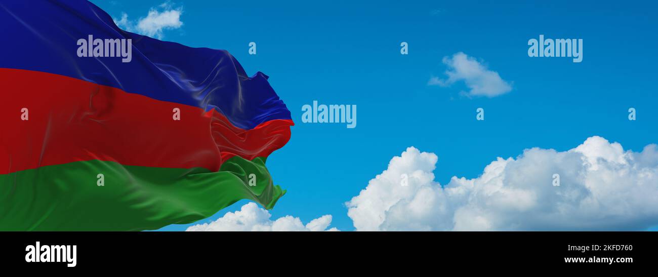 flag of Cushitic peoples Agaw people at cloudy sky background ...