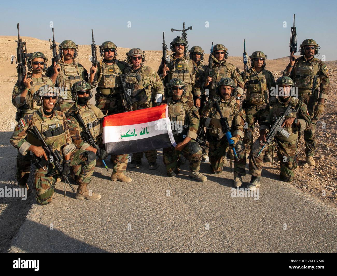 ZARQA, Jordan - Iraqi Security Forces service members pose for a group ...