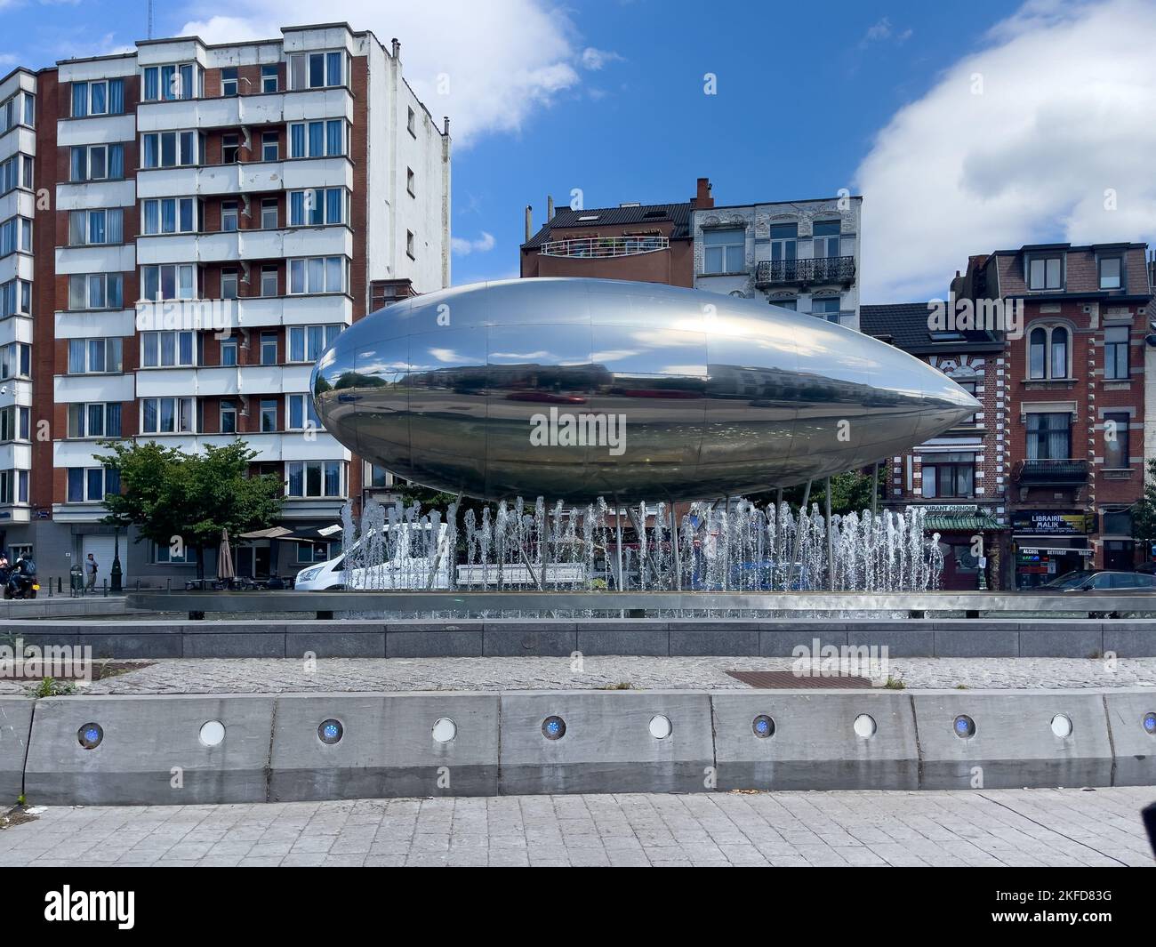 A metallic structure over the fountains on a Roundabout in Bruxelles ...