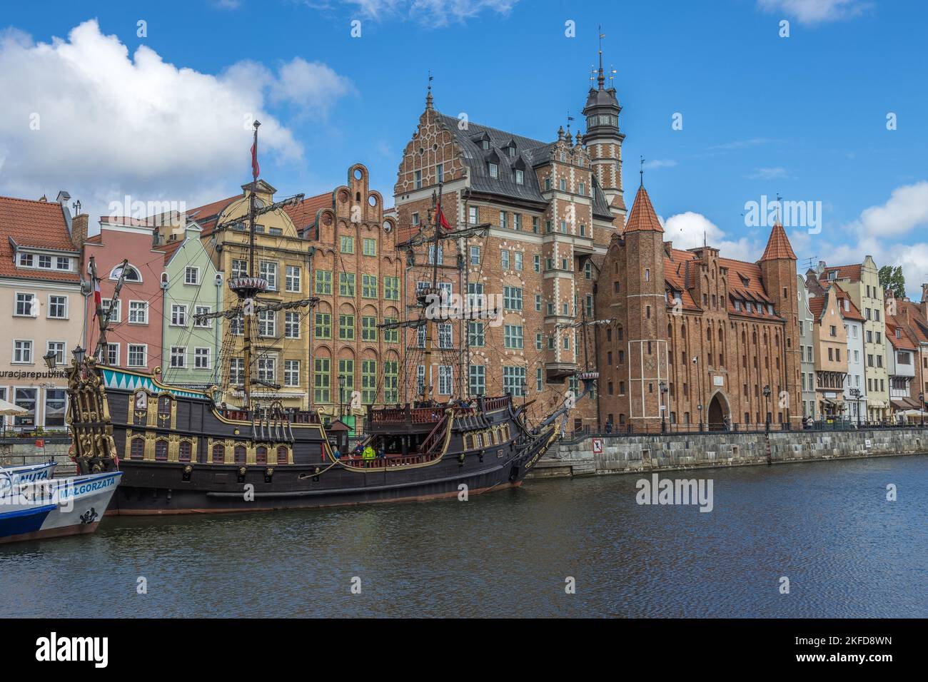 A beautiful shot of the beautiful old town buildings and water trams at ...