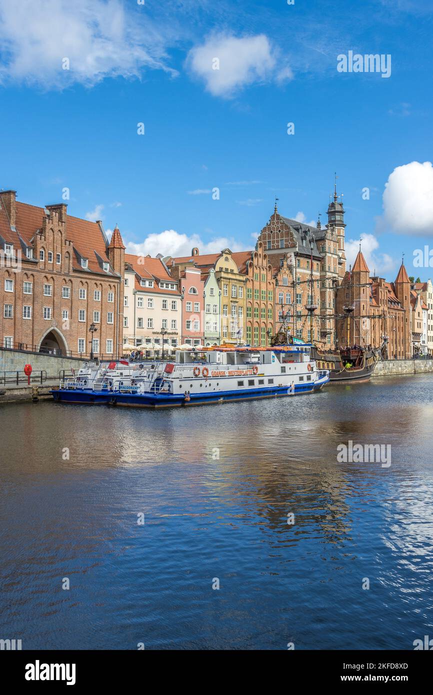 A vertical shot of the beautiful old town buildings and water trams at ...