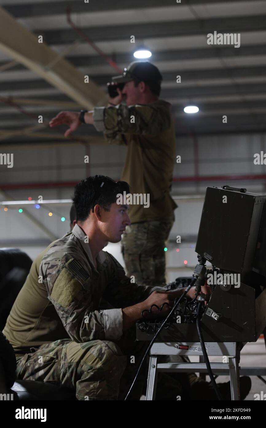 U.S. Army explosive ordnance disposal technicians, Sgt. Will Watson and ...