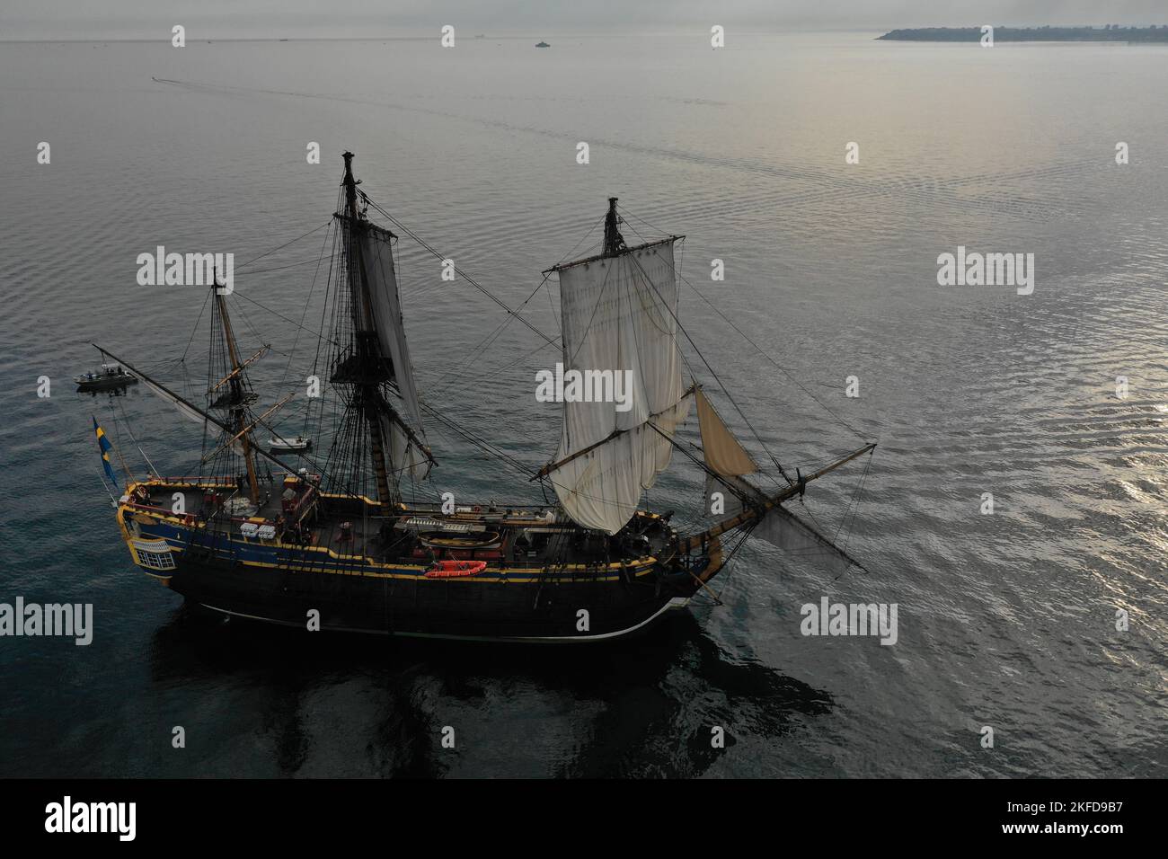 An aerial shot of a Swedish sailship called Gotheborg sailing on ocean ...