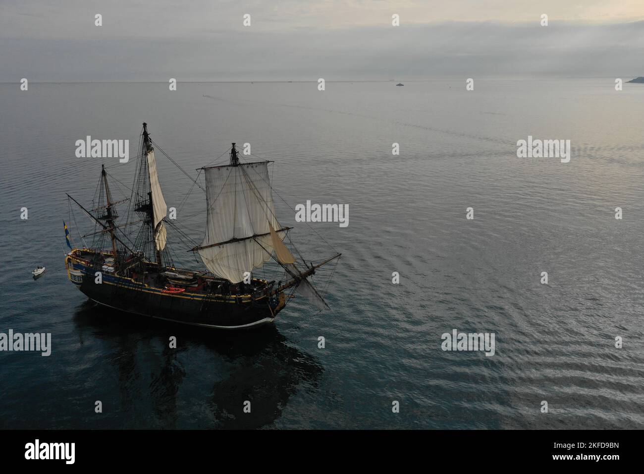 An aerial shot of a Swedish sailship called Gotheborg sailing on ocean ...