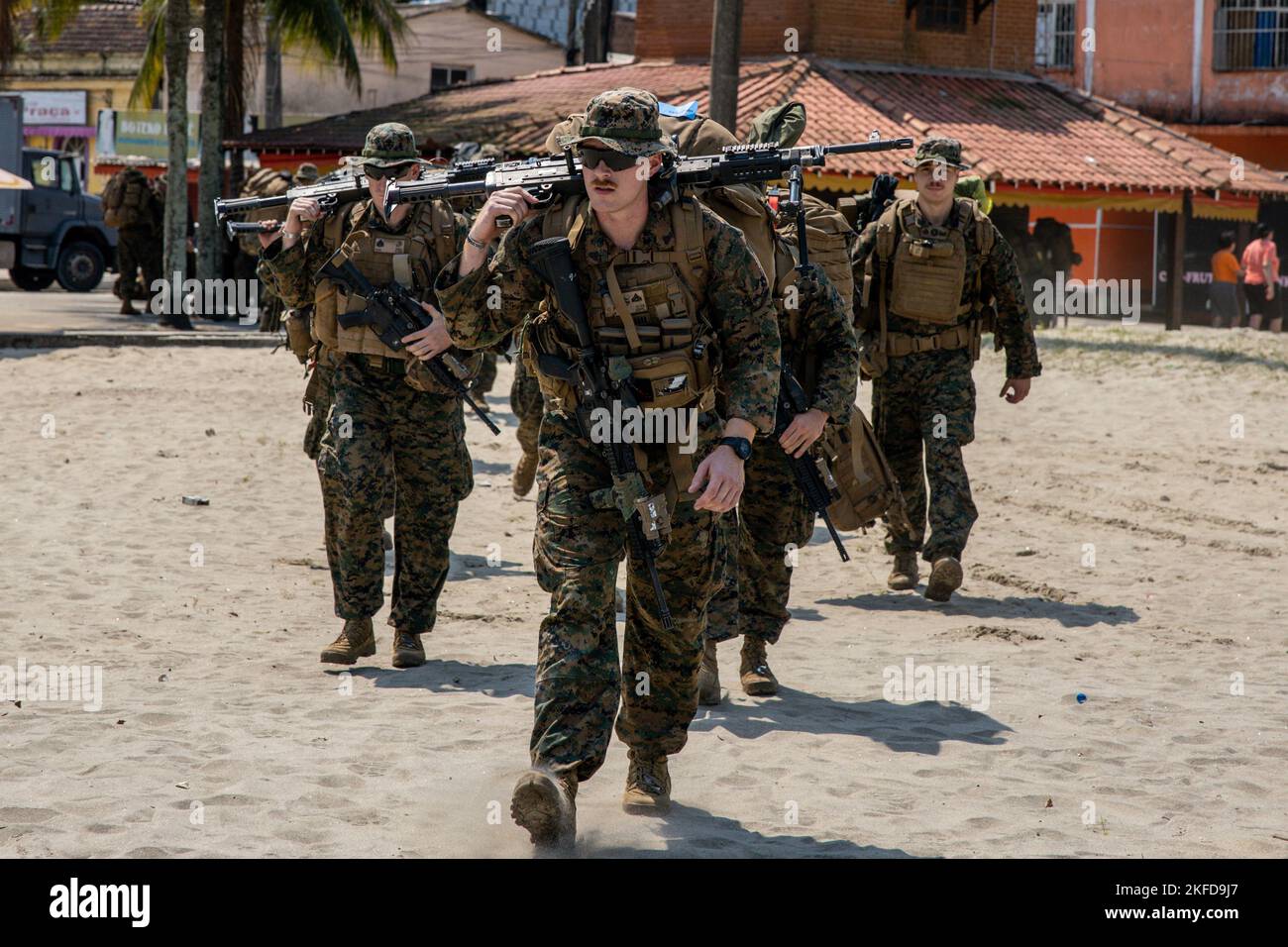 U.S. Marines with Lima Company, 3rd Battalion, 25th Marine Regiment, 4th Marine Division, in ...