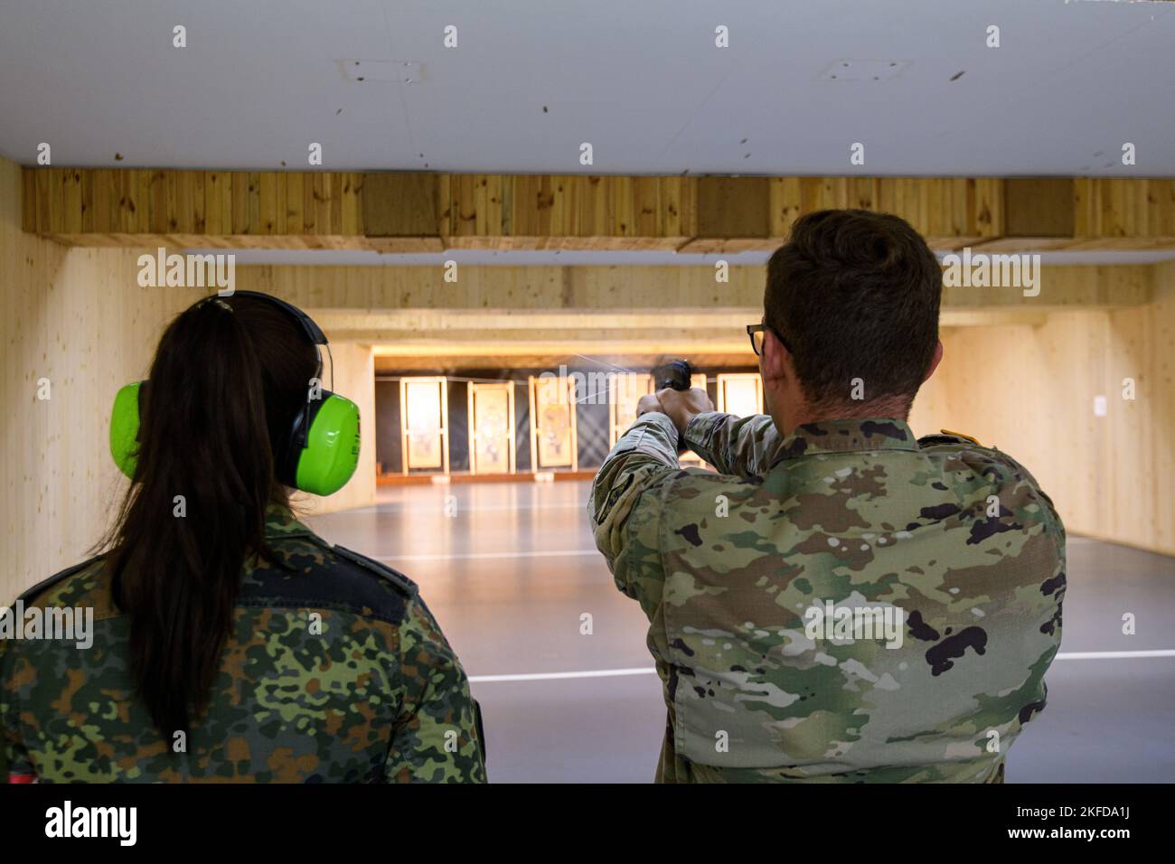 A German range safety watches as a U.S. Soldier with 39th Strategic ...