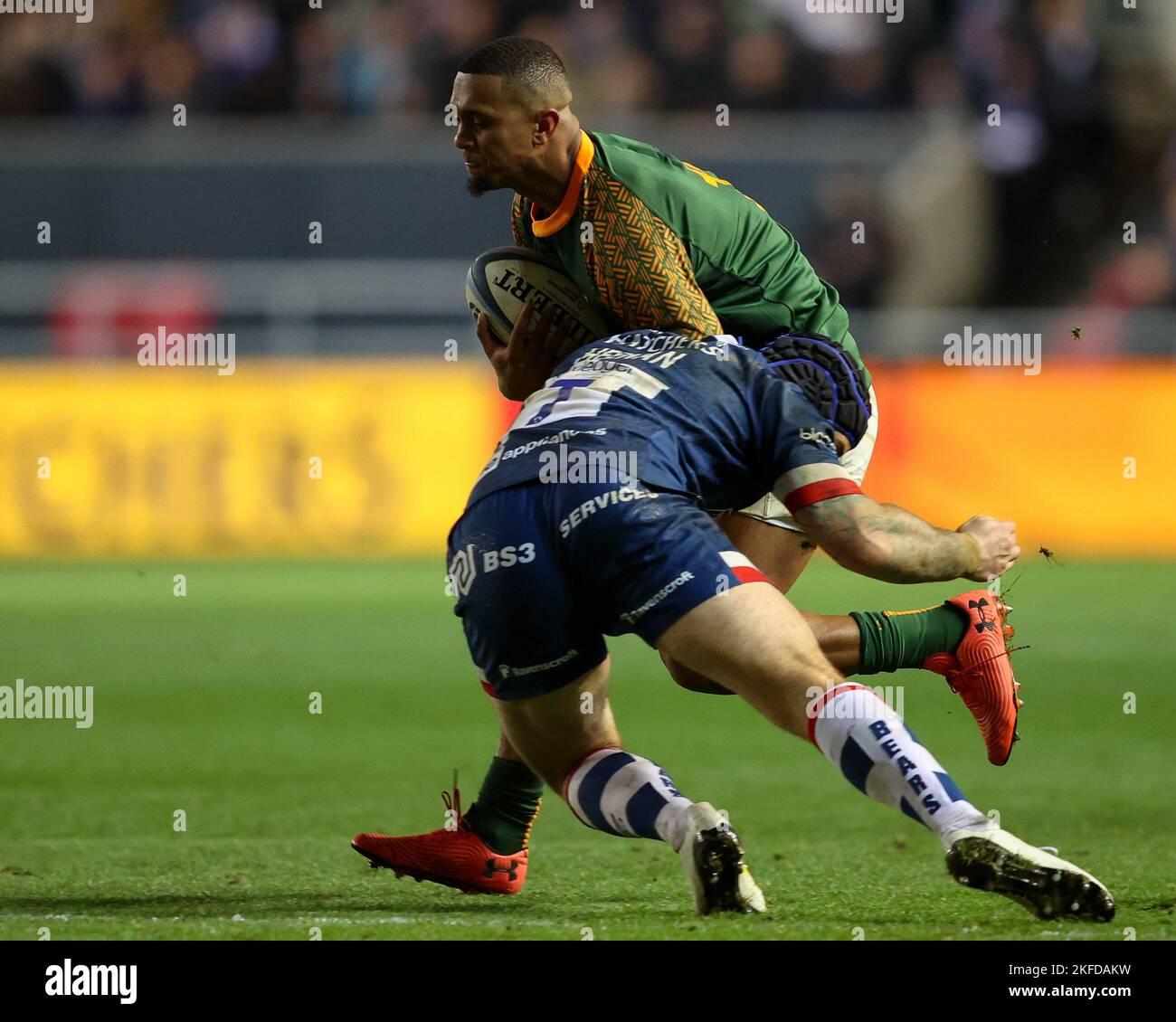 Leolin Zas of South Africa A is tackled by Jake Heenan of Bristol Bears ...