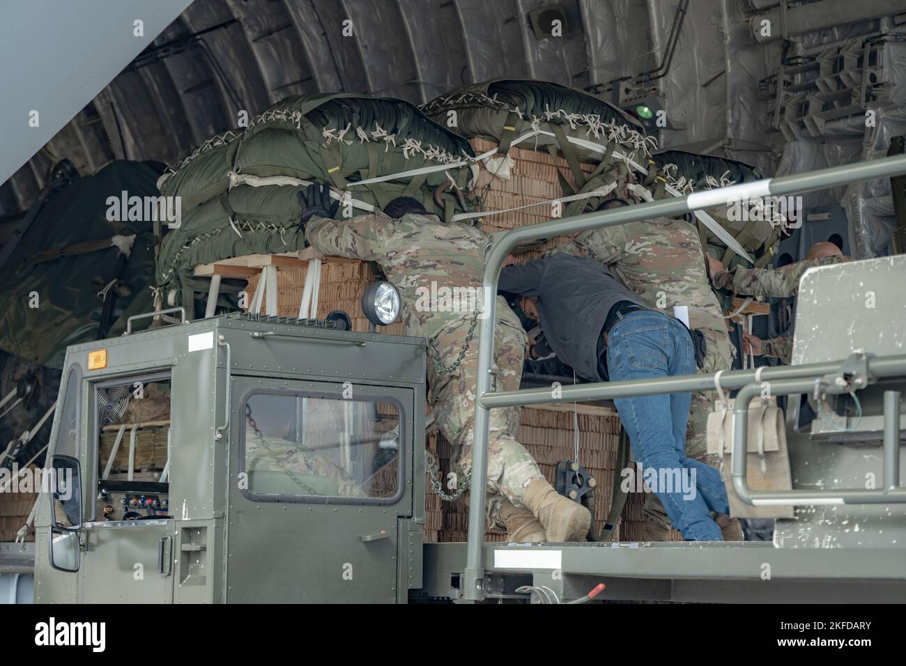 U.S. Air Force aerial porters assigned to the 721st Aerial Port ...
