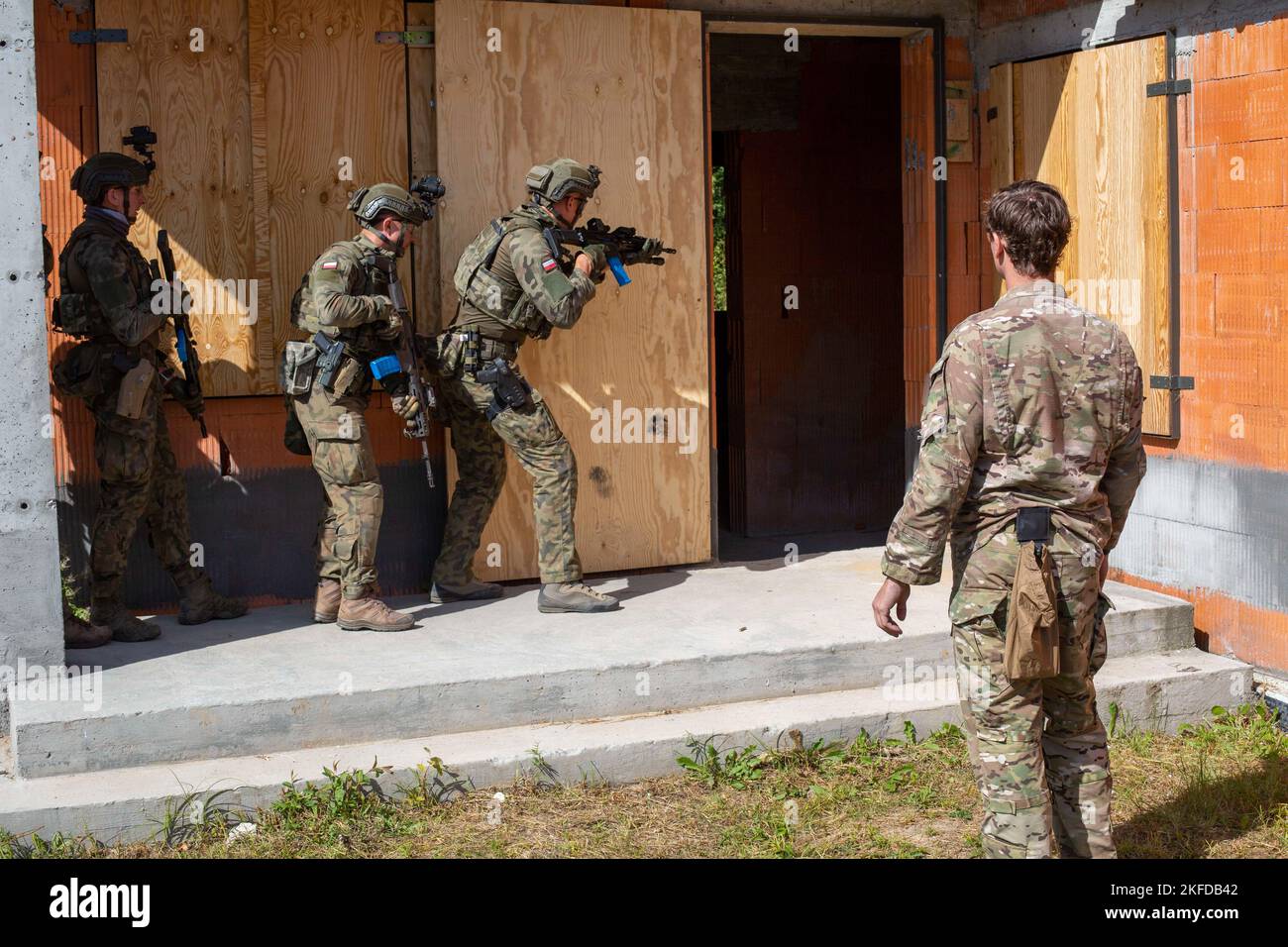 A Green Beret assigned to 10th Special Forces Group (Airborne) works ...