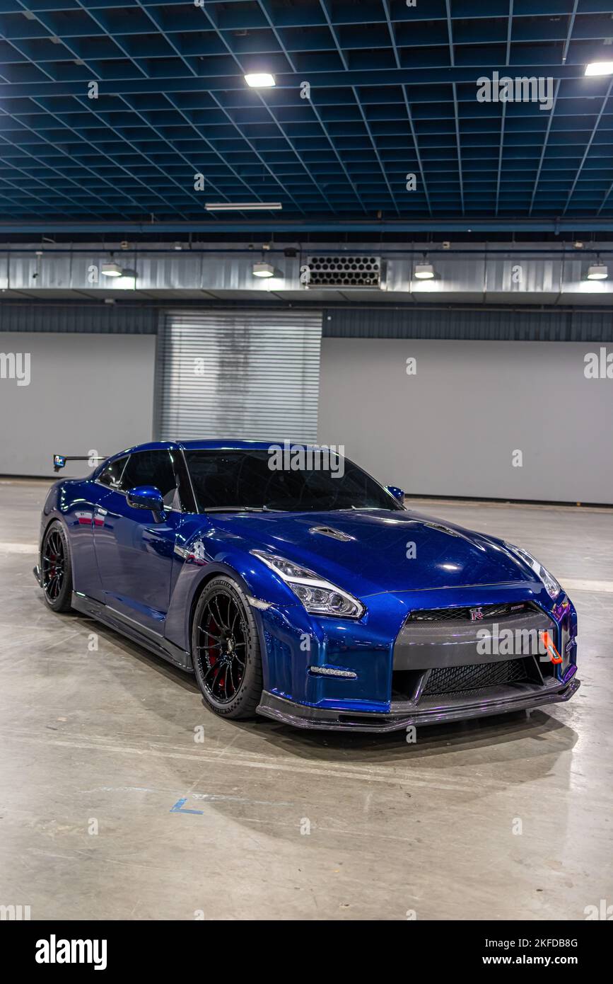 A blue Nissan GTR R35 during DAY1 World of Cars Stock Photo - Alamy
