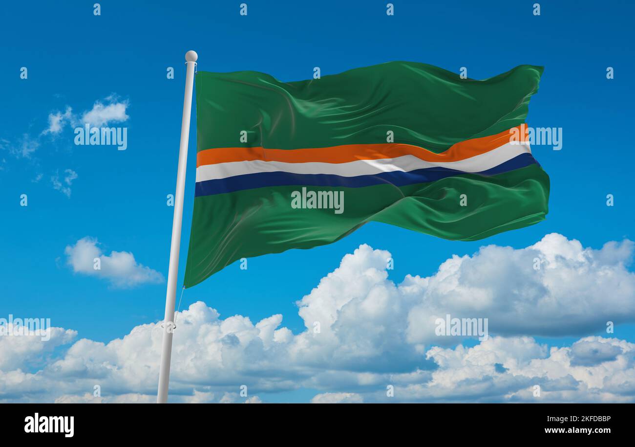 flag of Bantu peoples Kavango people at cloudy sky background ...