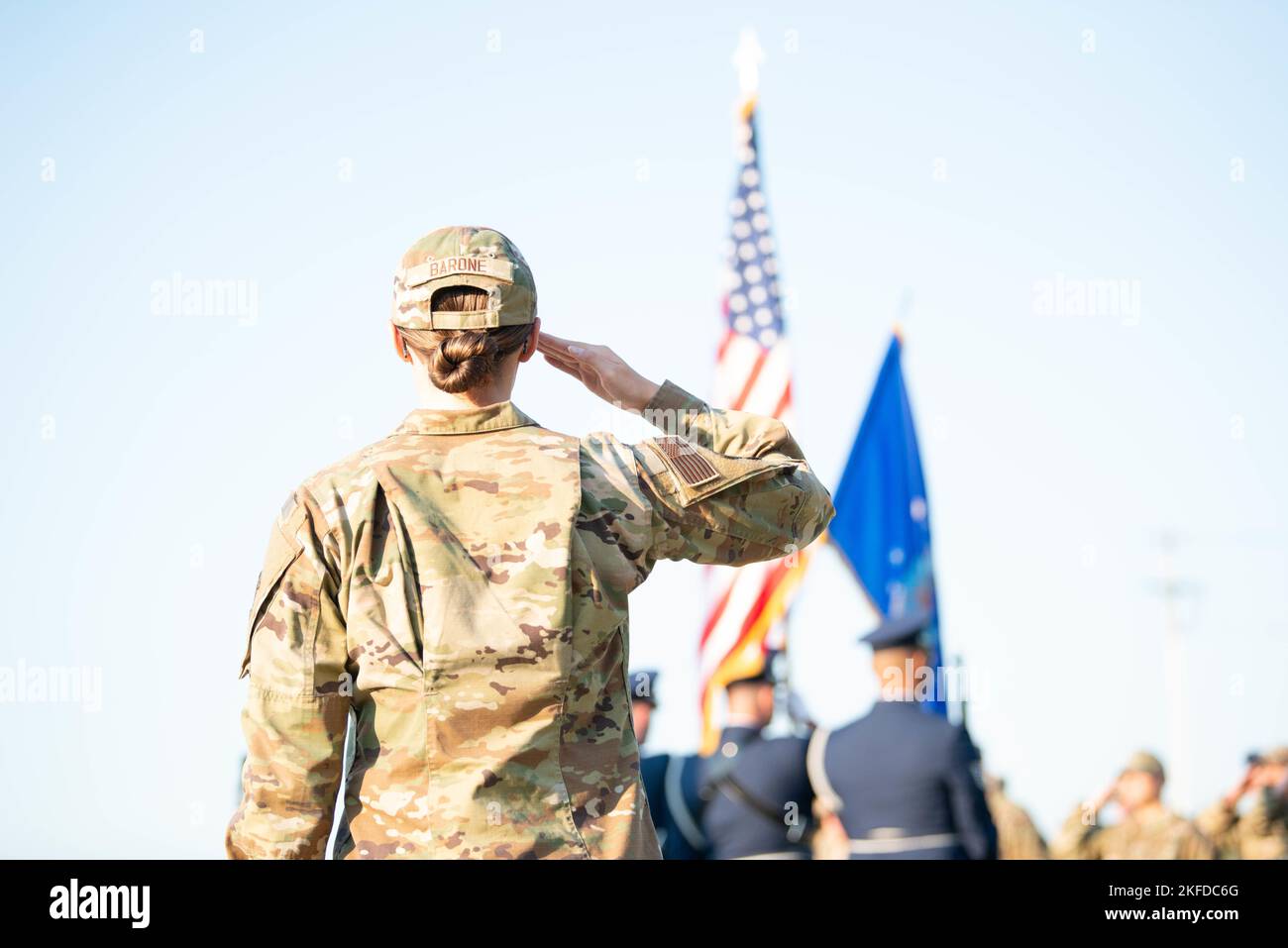 Airman Tess Barone salutes the flag during the 107 Attack Wing's ...