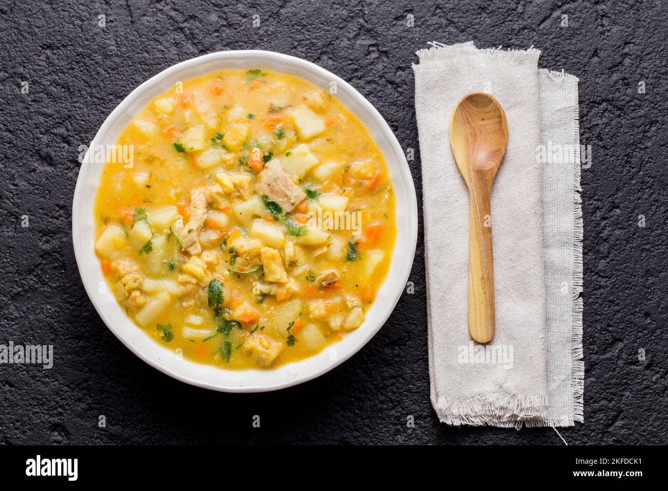 Tripe soup, mondongo on dark background, traditional food from Colombia ...