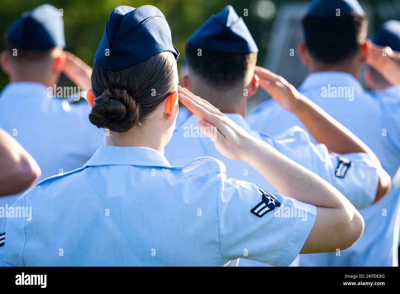 A U.S. Air Force Airmen assigned to the 35th Fighter Wing, renders a salute in formation during ...