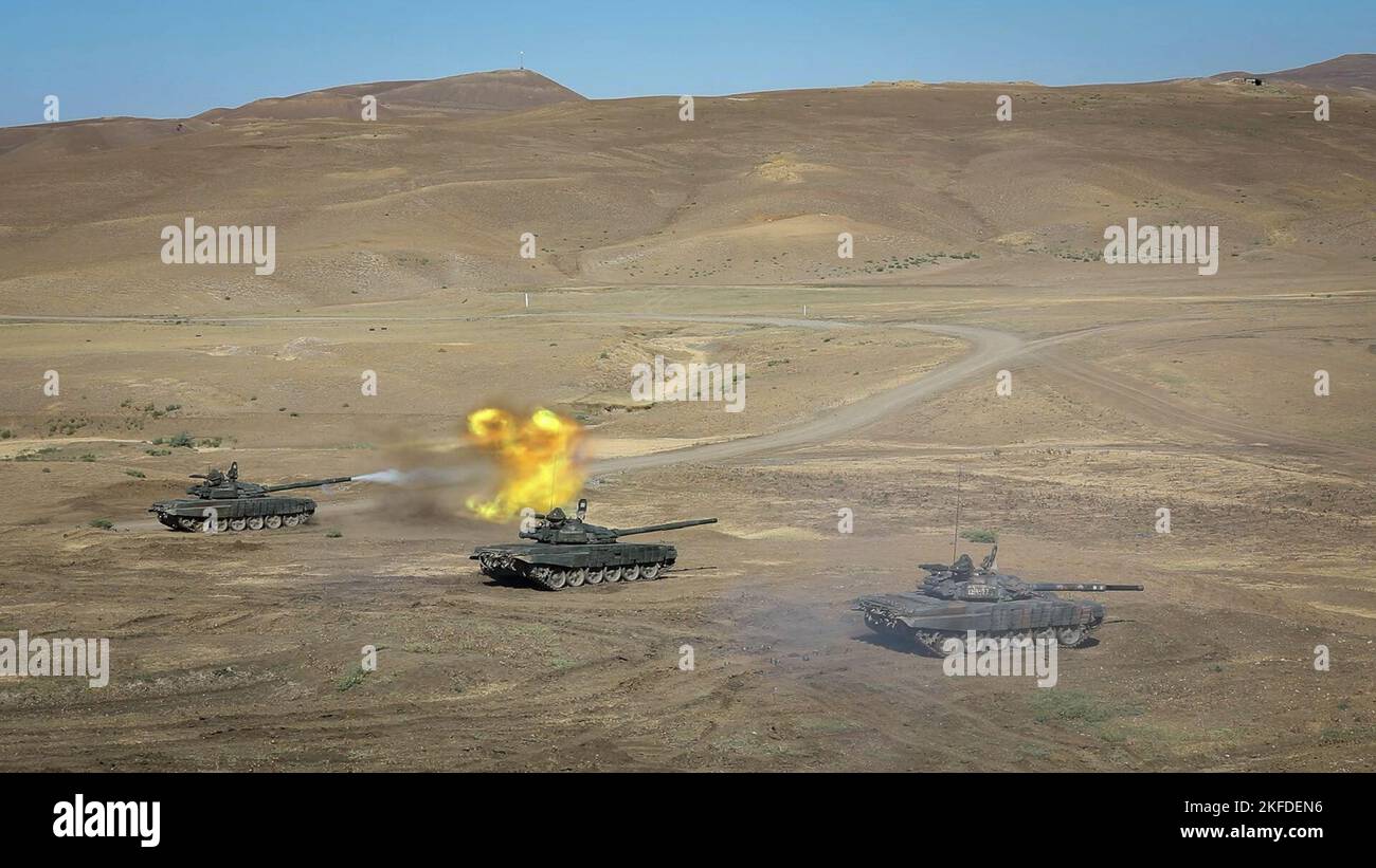 Three Georgian Armed Forces T-72 tanks fire during a combined arms live ...